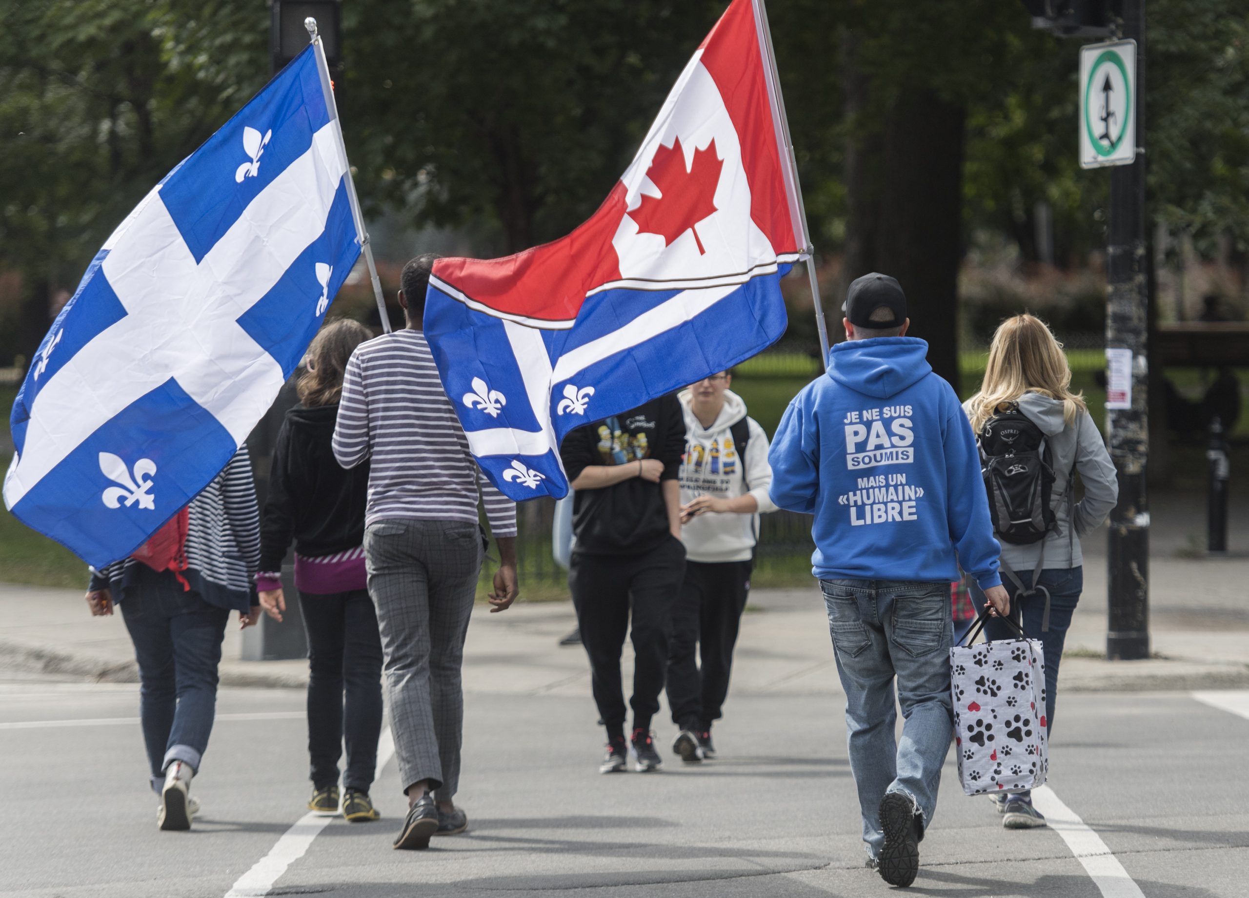 Addressing anti-mask protests poses a challenge for leaders, experts say