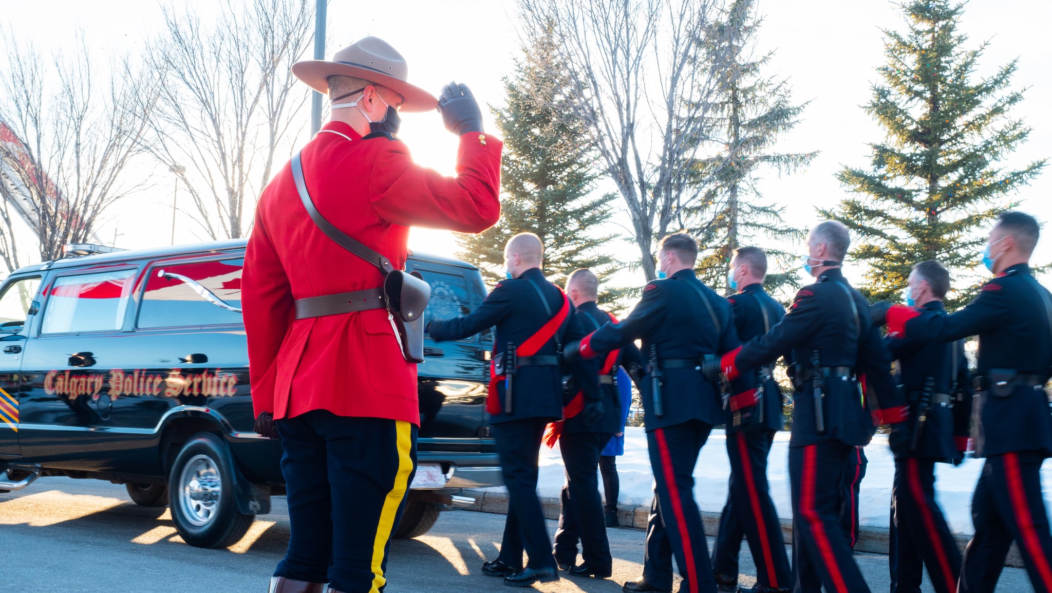 Calgary police say farewell to fallen officer with solemn procession