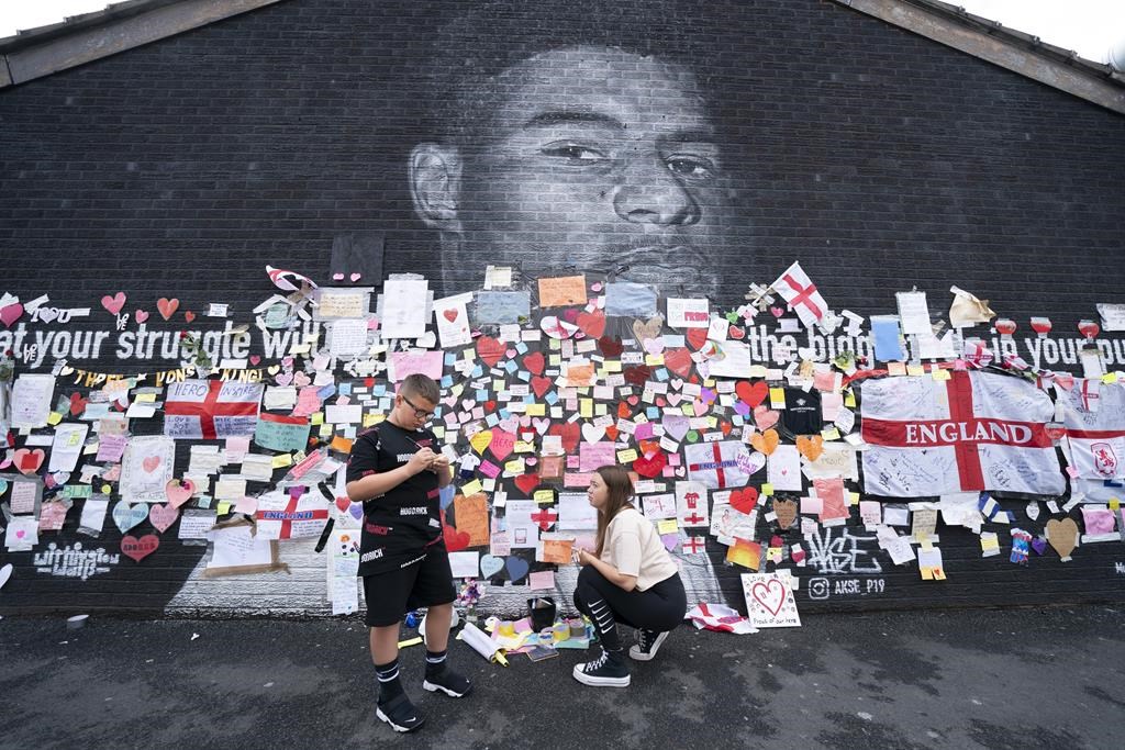 Mural in soccer star's hometown becomes anti-racism symbol