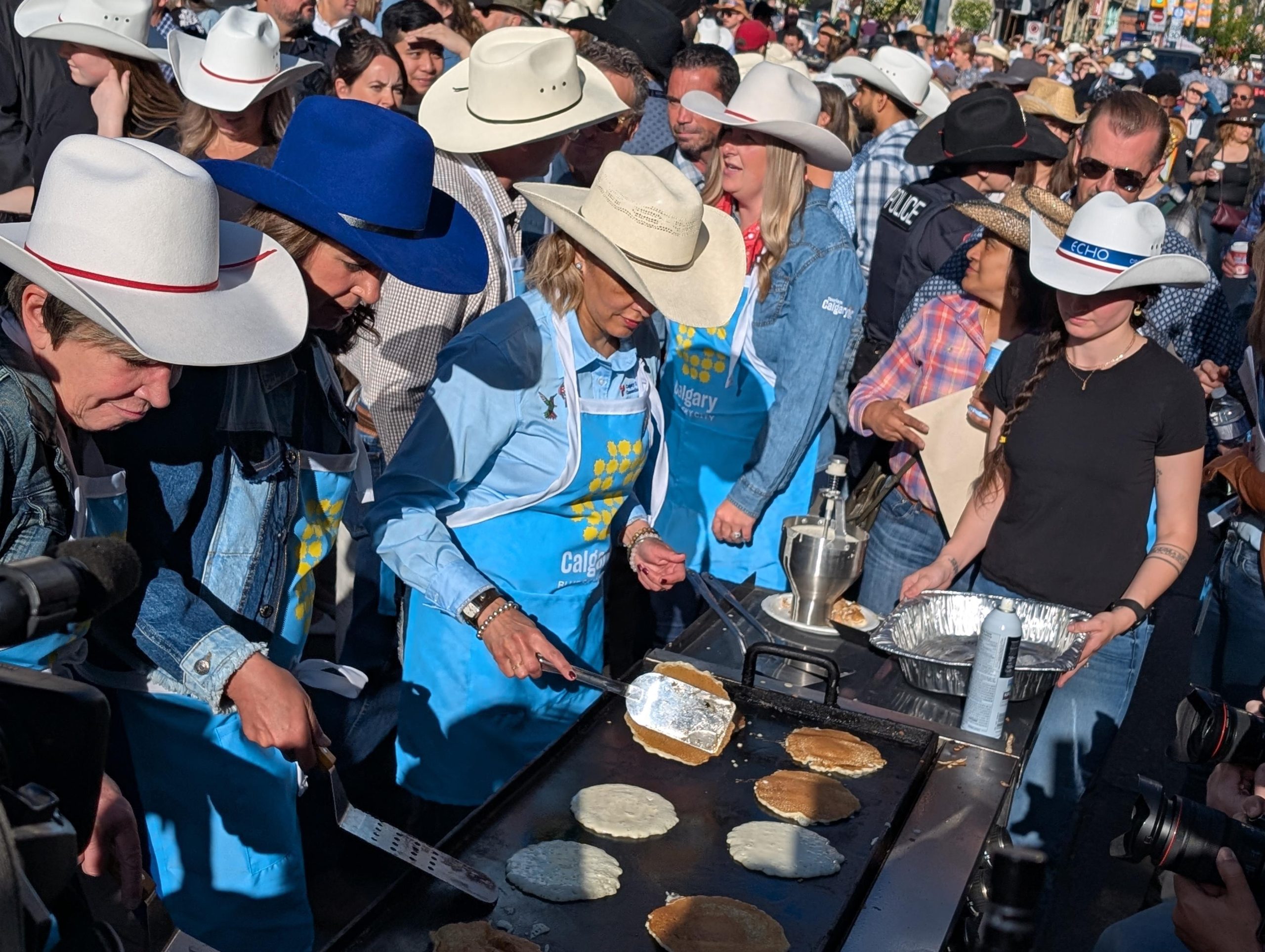 Crowds turn out for 'first flip' of Calgary Stampede