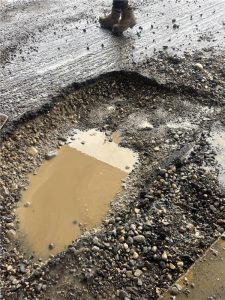 Several flat tires reported in SW Calgary due to pothole