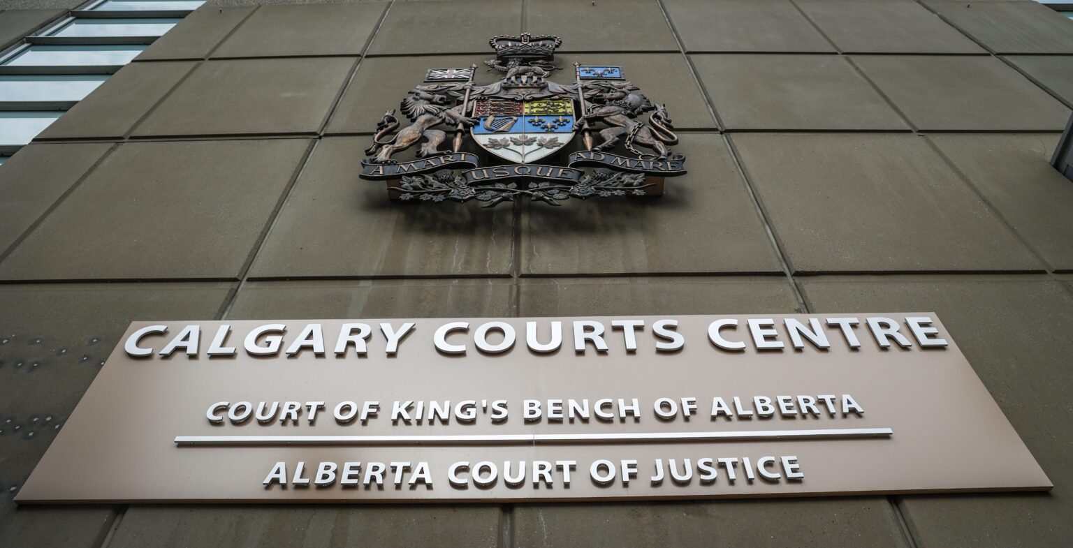 Judge reduces charges for two men accused in fatal roadside shooting ...